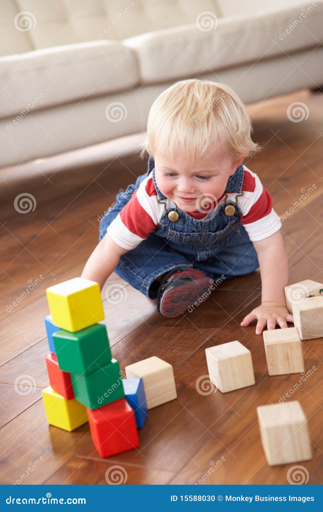 Young Boy Playing with Coloured Blocks at Home Stock Photo - Image of ...