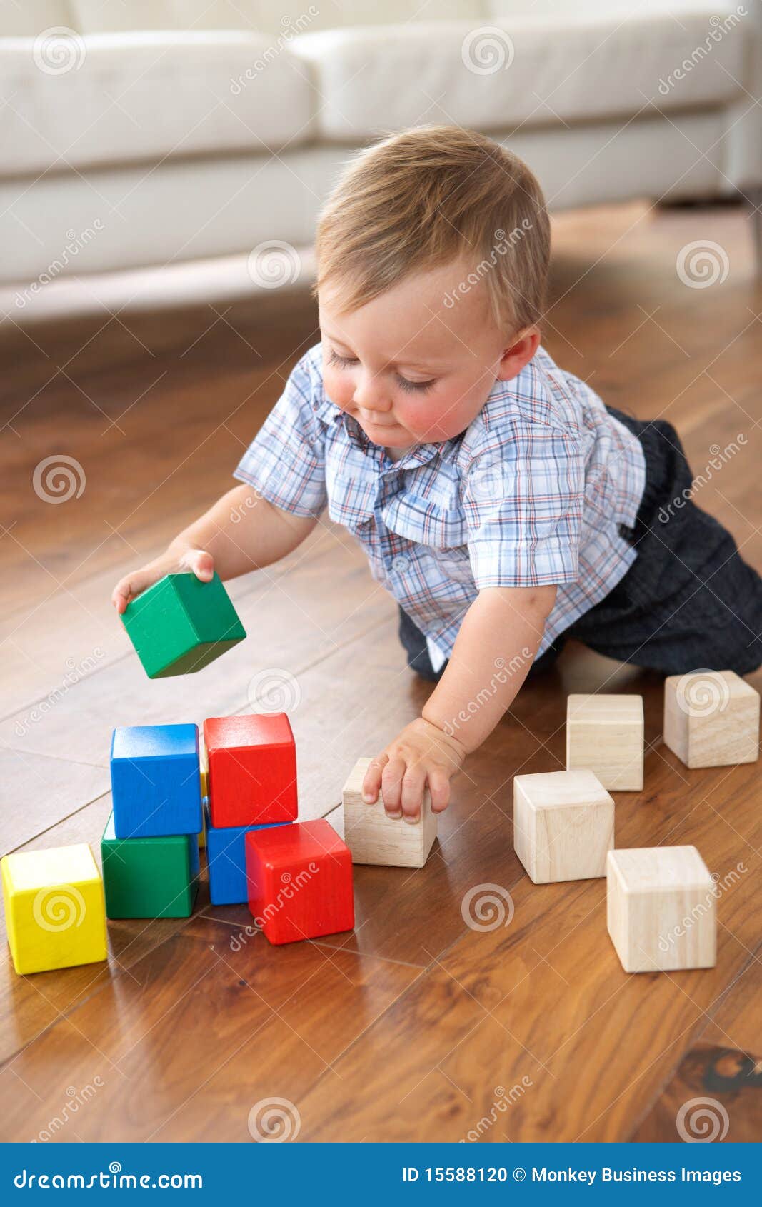 Young Boy Playing with Coloured Blocks at Home Stock Photo - Image of ...