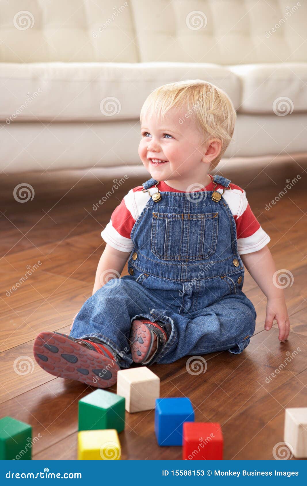 Young Boy Playing with Coloured Blocks at Home Stock Image - Image of ...