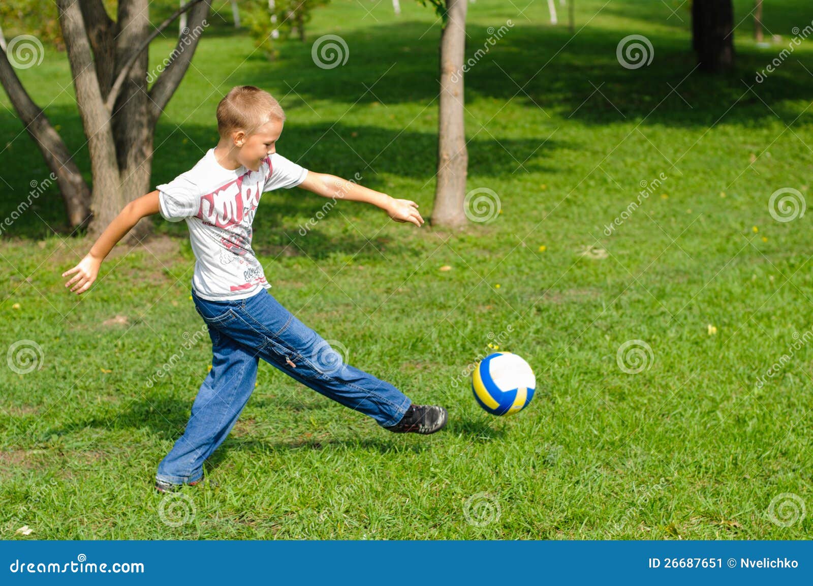 Young Boy Playing Football Outdoors Stock Image - Image of people, foot ...