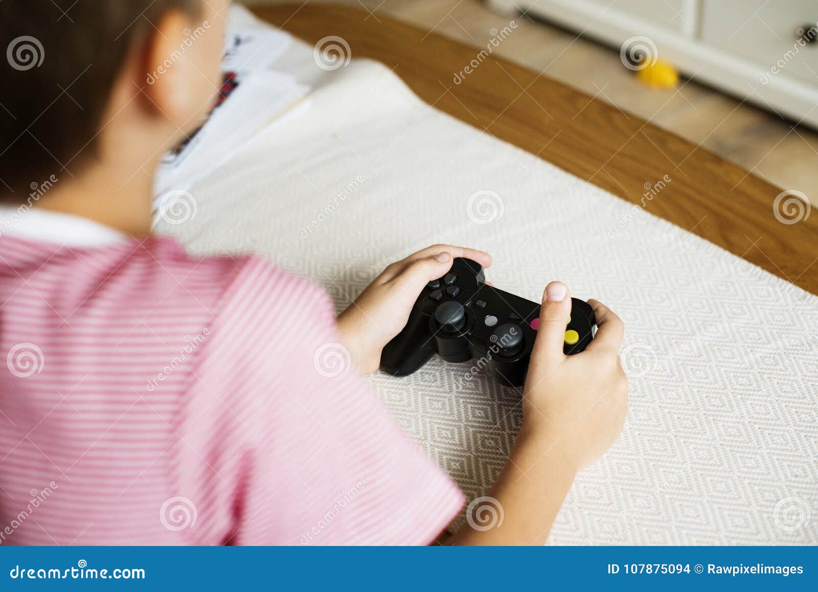 Young Boy Playing Game Using Gaming Console Stock Photo - Image of ...