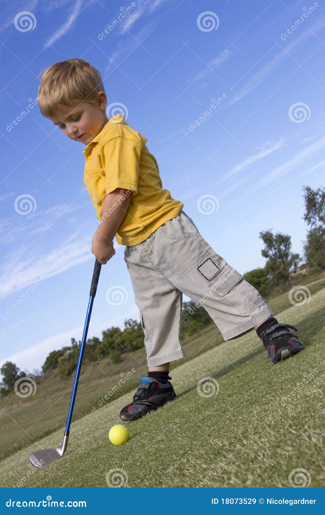 Young boy playing Golf stock image. Image of happiness - 18073529