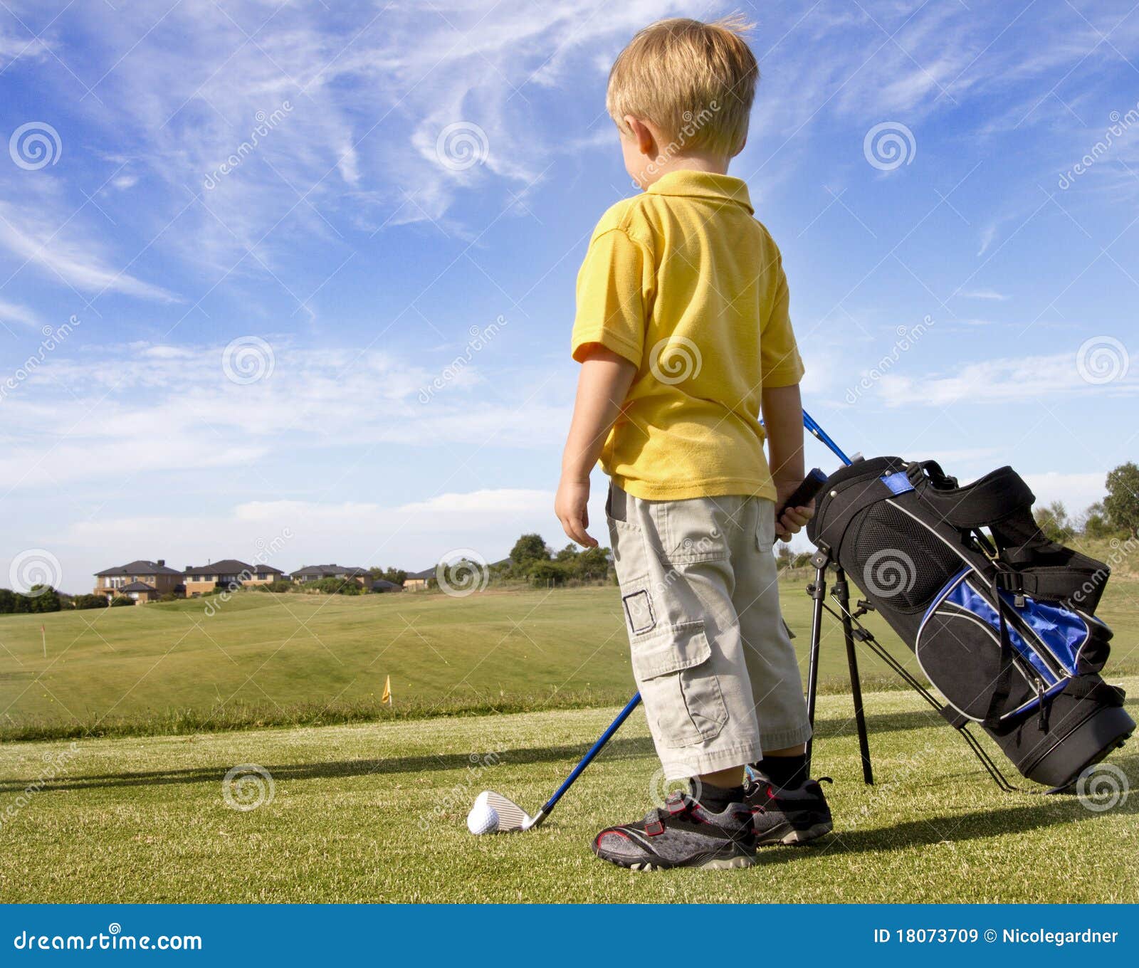 Young boy playing Golf stock image. Image of fairway - 18073709