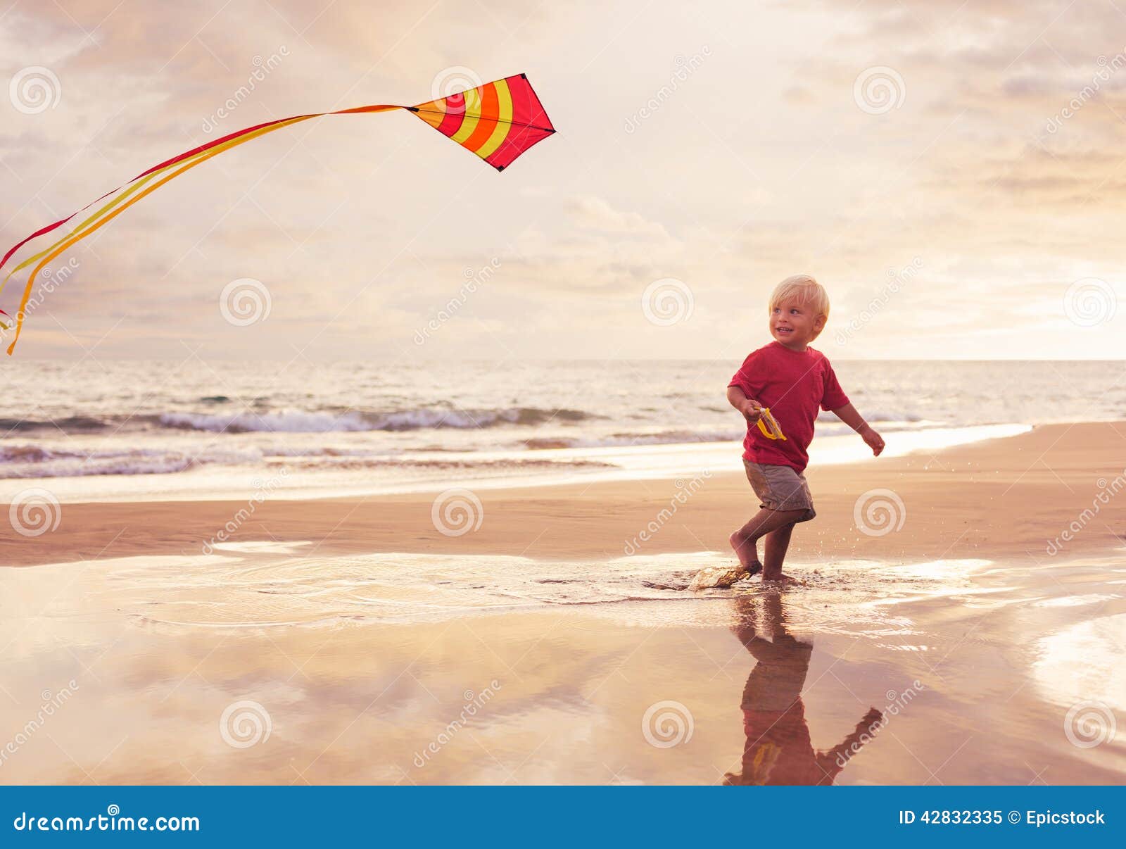 Young Boy Playing with Kite Stock Image - Image of laughing, holiday ...