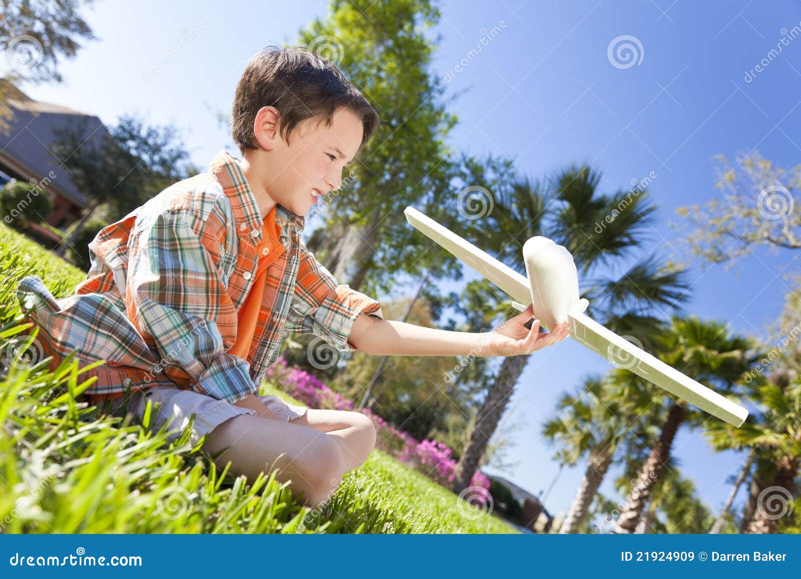 Young Boy Playing with Model Airplane Outside Stock Image - Image of ...