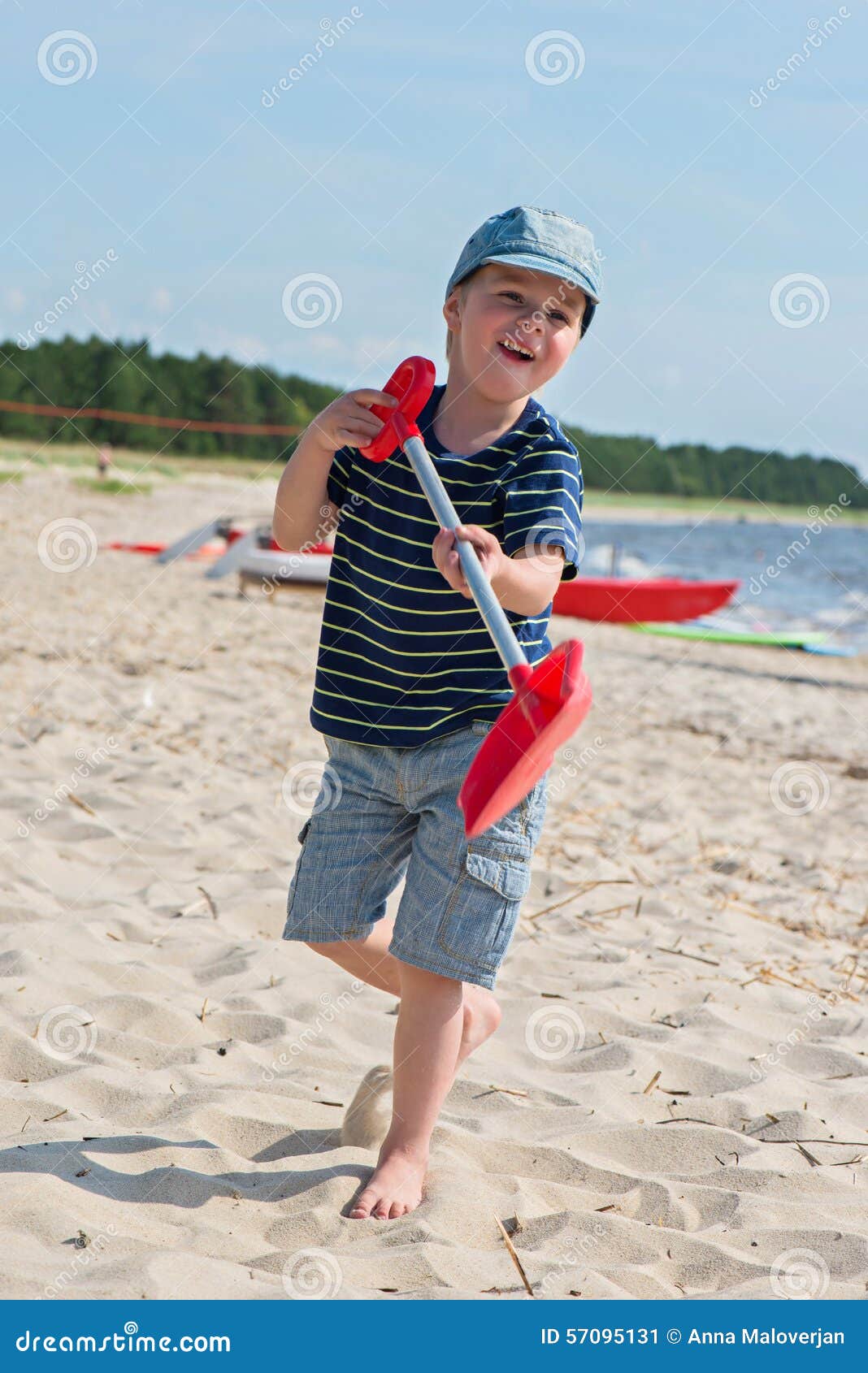 Red Shovel In The Beach. Stock Photo | CartoonDealer.com #96898260