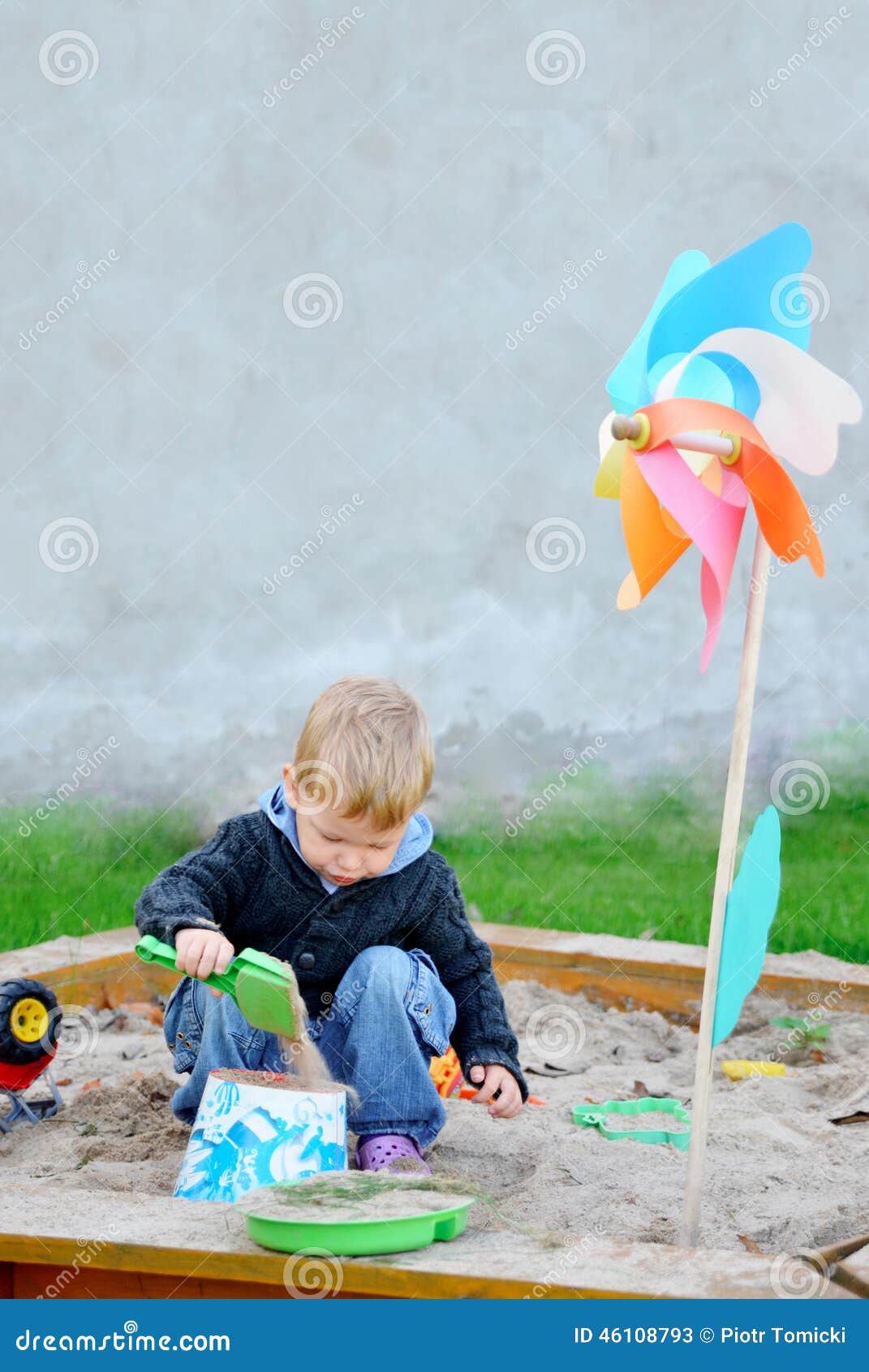Young Boy Playing in the Sandbox Stock Image - Image of outside, sunny ...