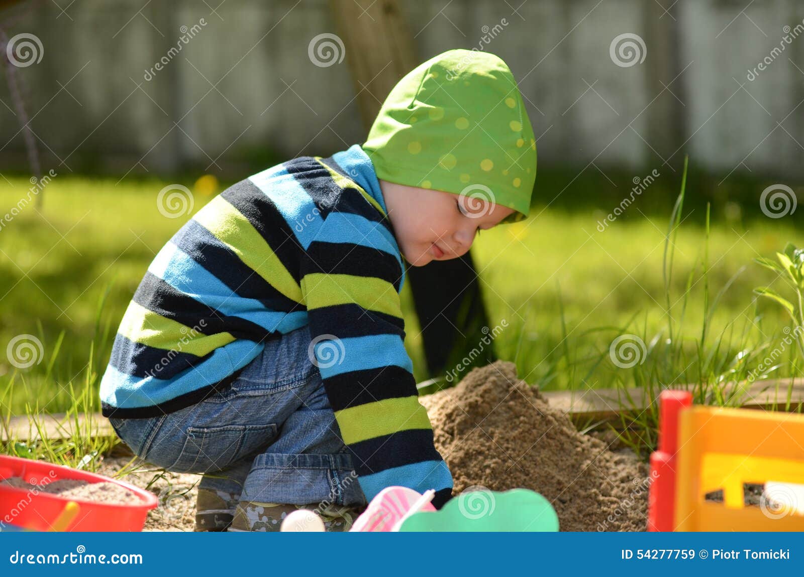 Young Boy Playing in the Sandbox Stock Image - Image of activity ...