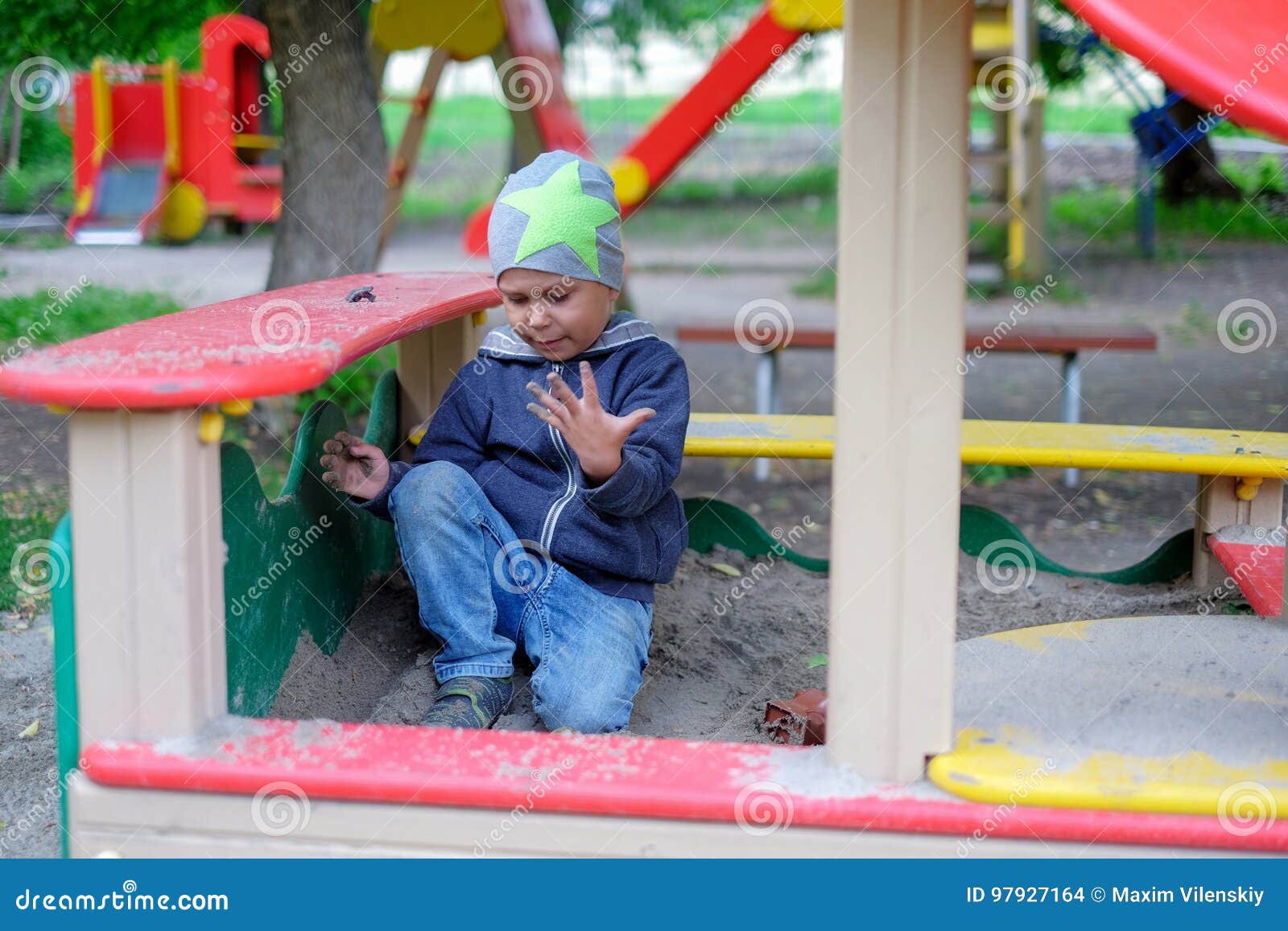 Young Boy Playing in the Sandbox Stock Photo - Image of child, boys ...