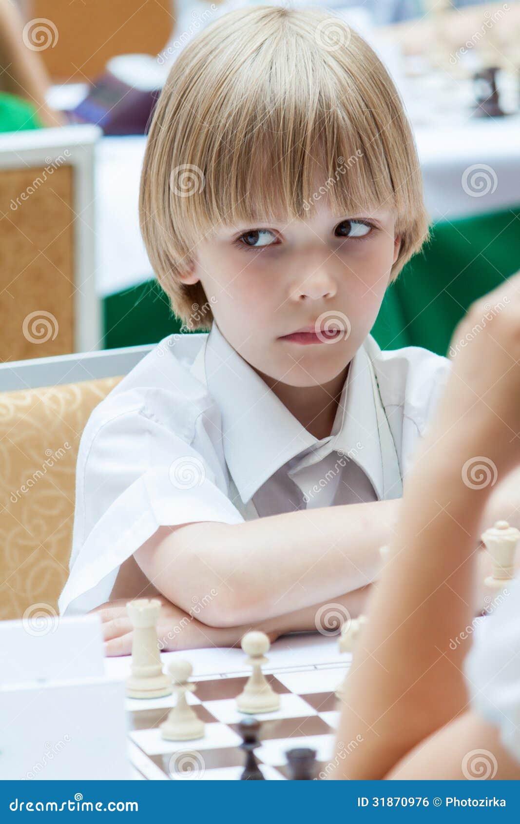 Young boy plays chess stock photo. Image of enjoy, head - 31870976