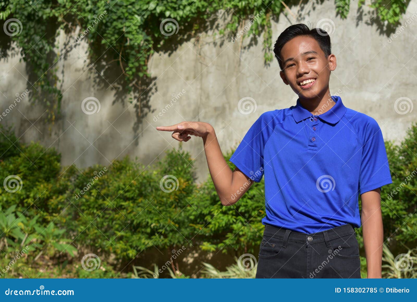 An a Young Boy Pointing stock image. Image of male, youth - 158302785
