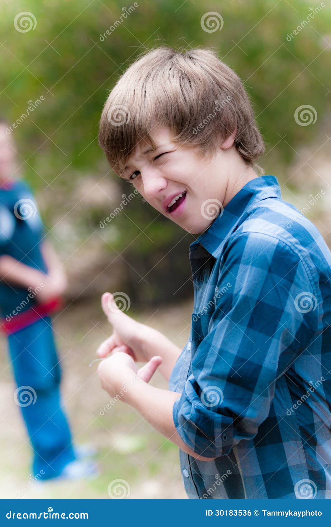 Young Boy Pointing Backwards Stock Photo - Image of human, happiness ...