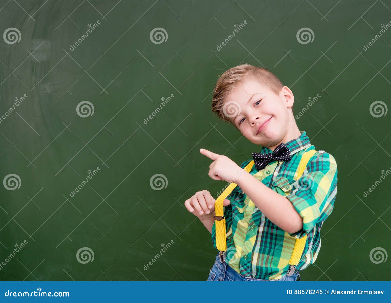 Young Boy Points on Empty Green Chalkboard Stock Image - Image of ...