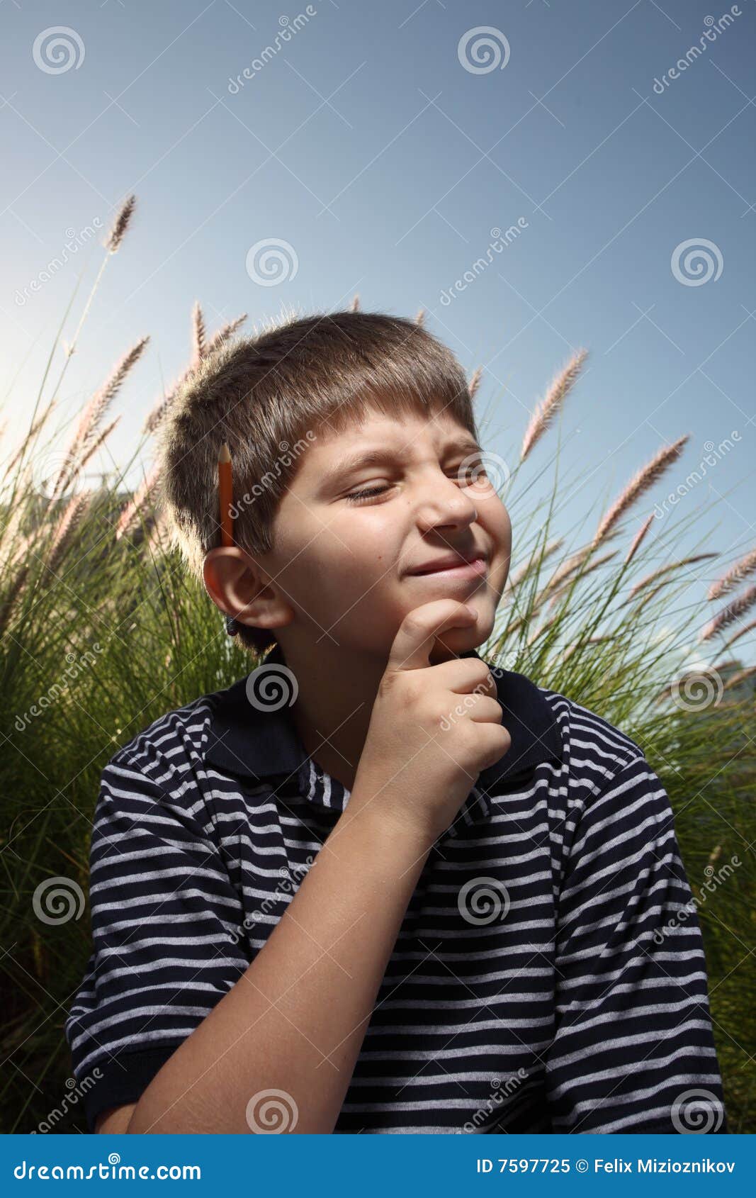 Young boy pondering stock image. Image of pensive, copy - 7597725