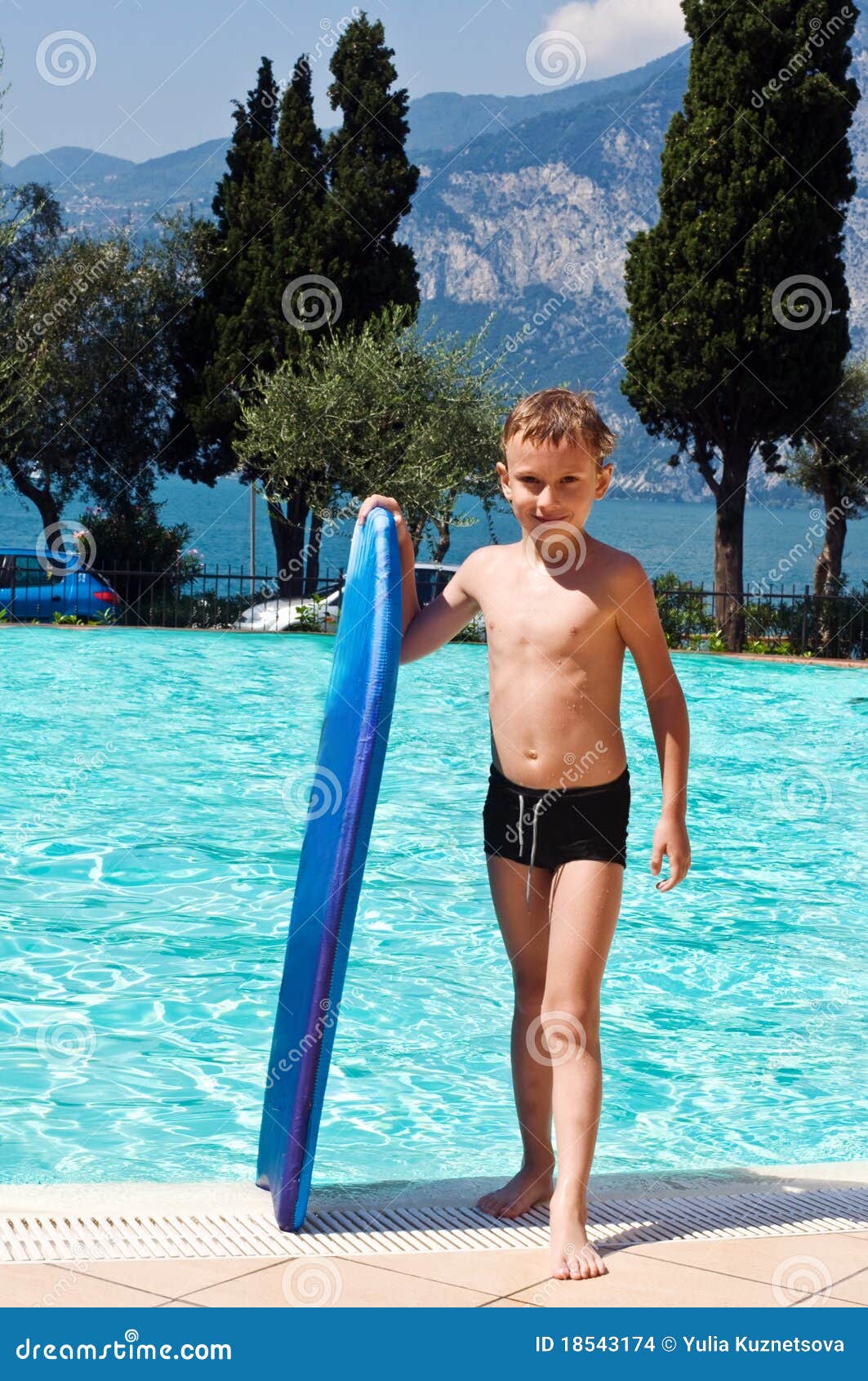 Young boy at a pool stock photo. Image of smile, italy - 18543174