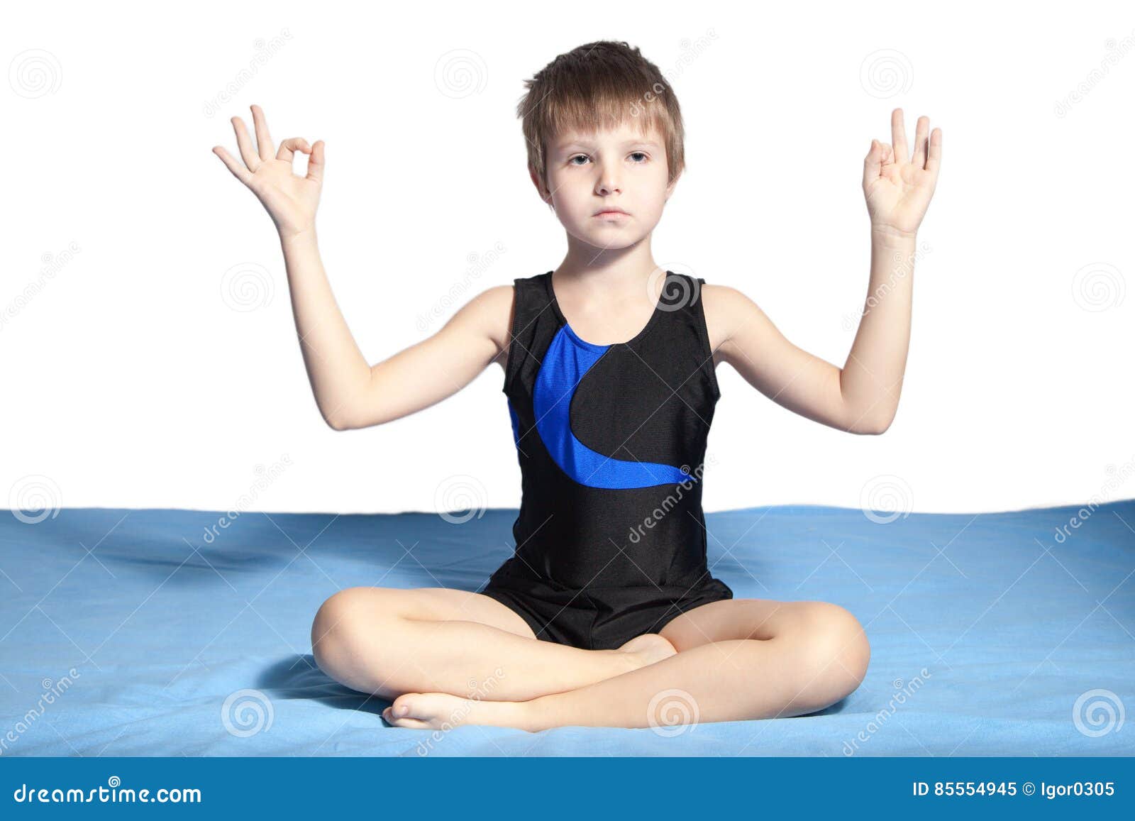 Young boy practices yoga stock image. Image of beautiful - 85554945