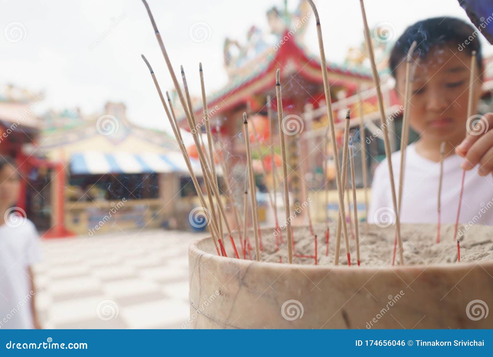 Young Boy Pray with Incense Stick at Temple Stock Photo - Image of ...