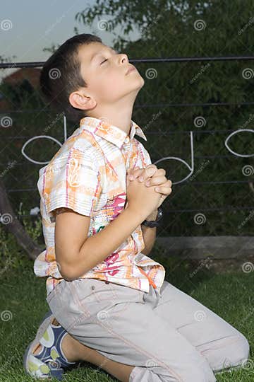 Young boy praying stock image. Image of beauty, christian - 6064669