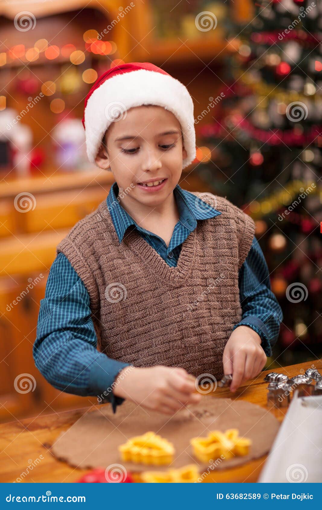 Young Boy Preparing Christmas Cookies Stock Image - Image of helpful ...