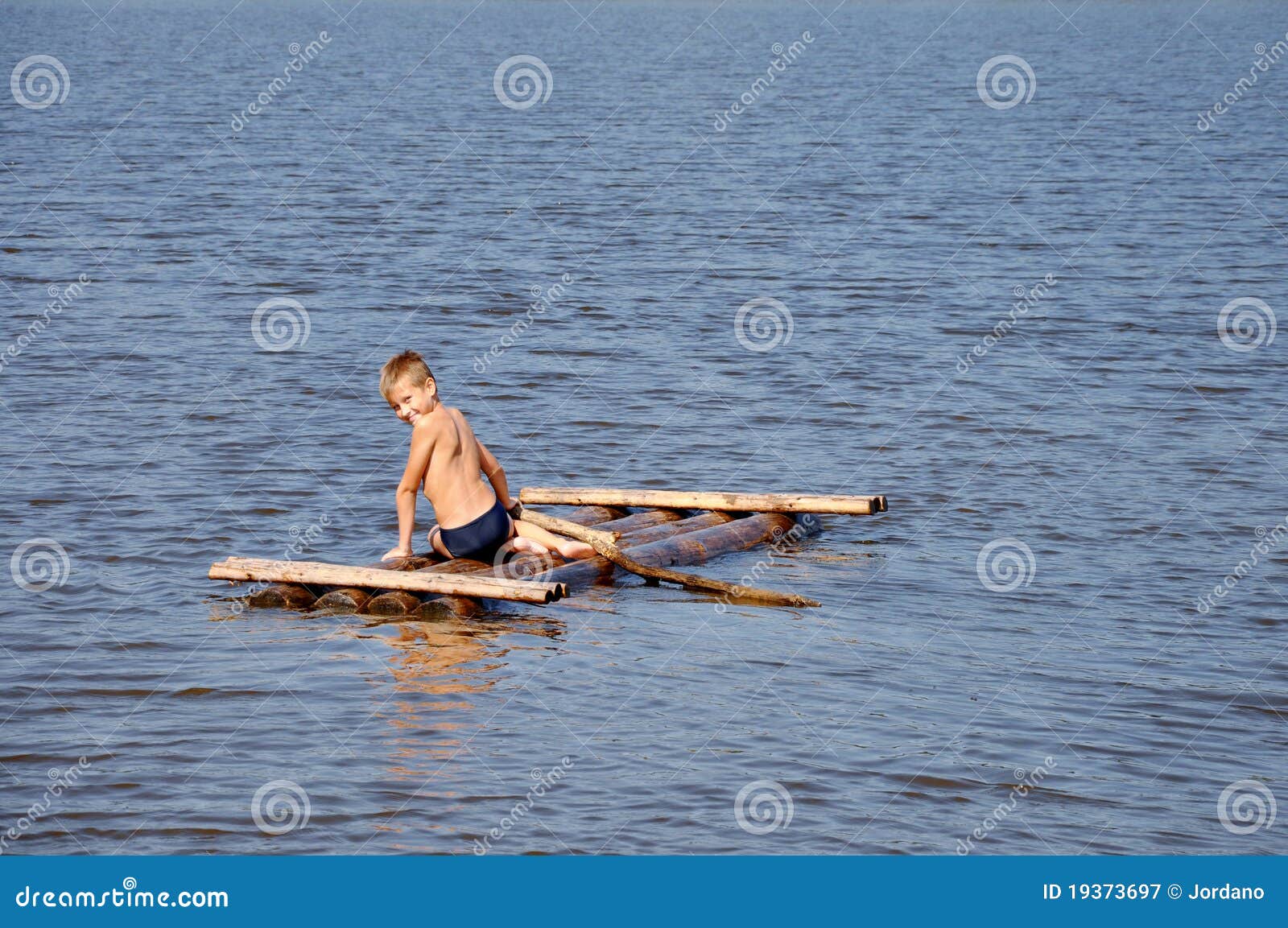 Young Boy on Raft in the Water Stock Image - Image of float, pull: 19373697