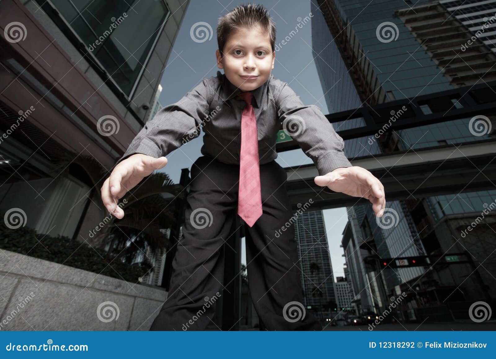 Young Boy Reaching Towards the Camera Stock Photo - Image of building ...