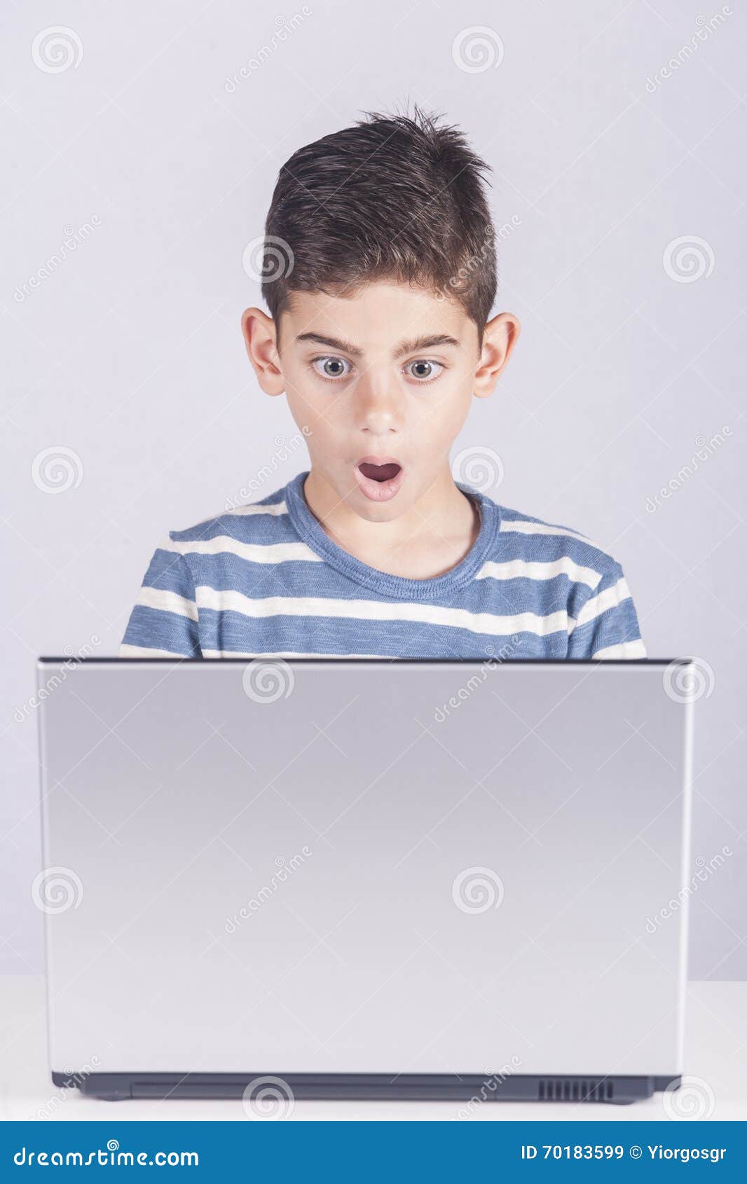 Young Boy Reacts while Using a Laptop Stock Image - Image of illegal ...