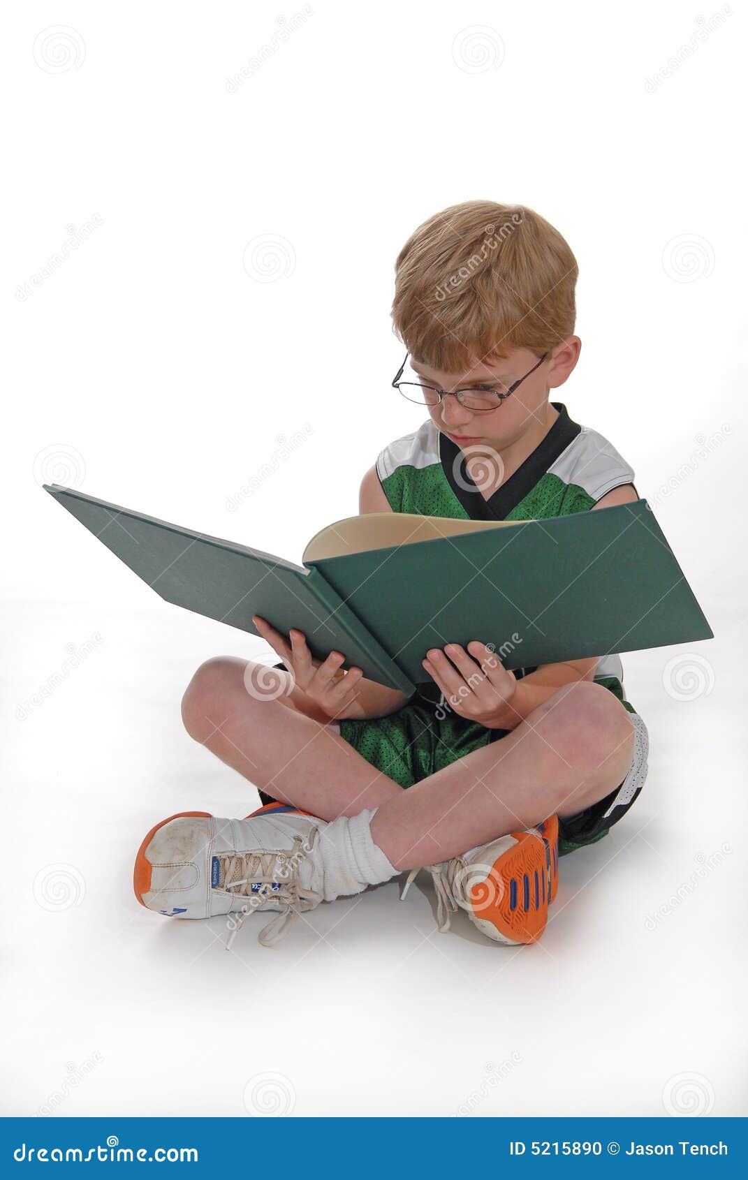 Young boy reading stock photo. Image of reading, person - 5215890