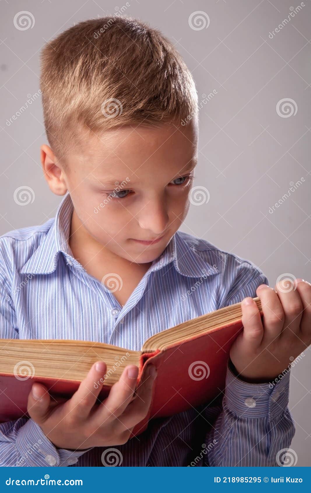 Young Boy Reading Book As Symbol of Education and Self Development ...