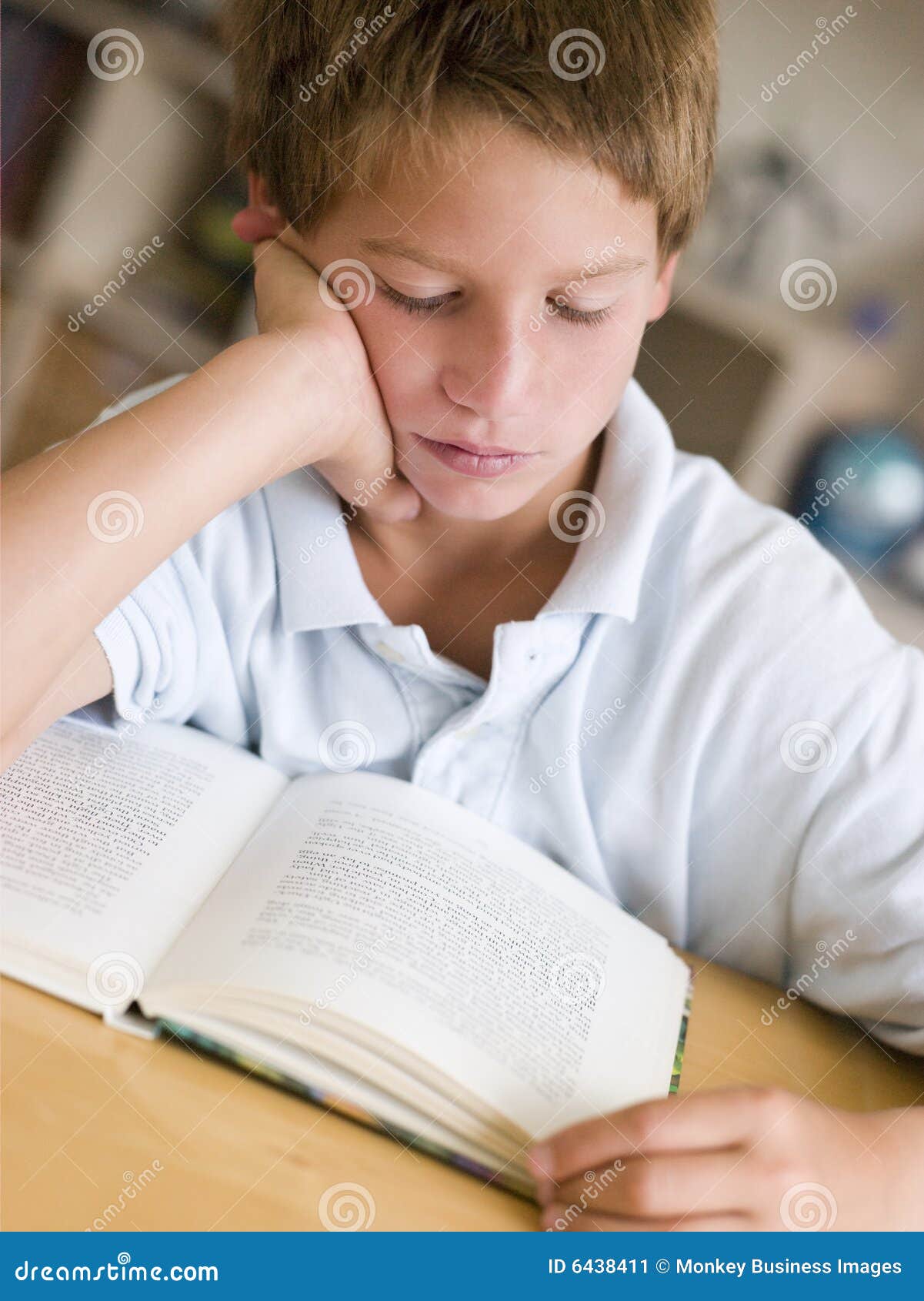 Young Boy Reading a Book in His Room Stock Image - Image of adolescent ...