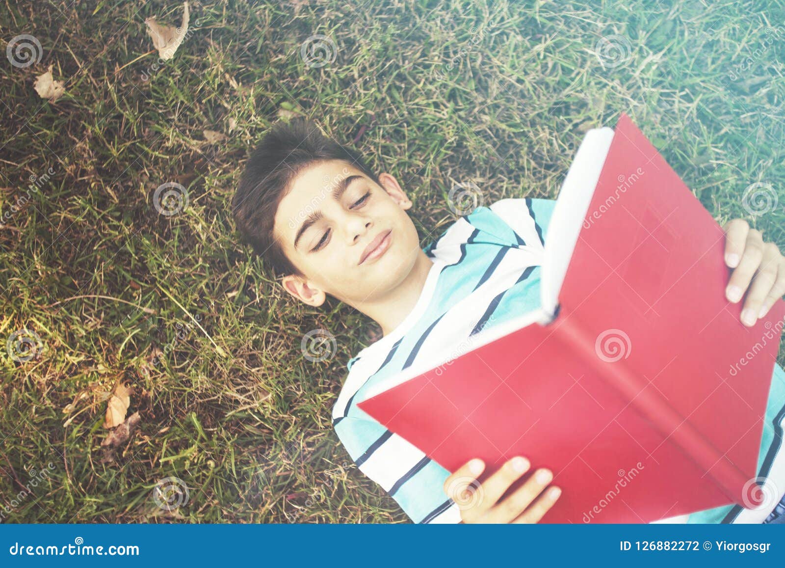 Little Boy Reading Outdoors Stock Photo - Image of childhood, caucasian ...