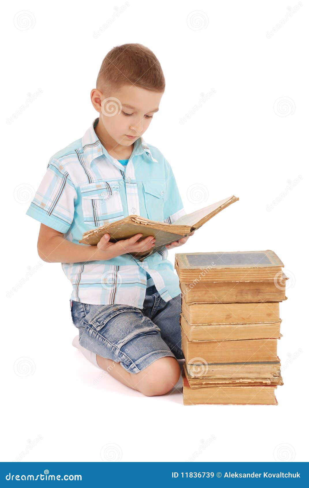 Young Boy Reading a Old Book Stock Image - Image of children, library ...