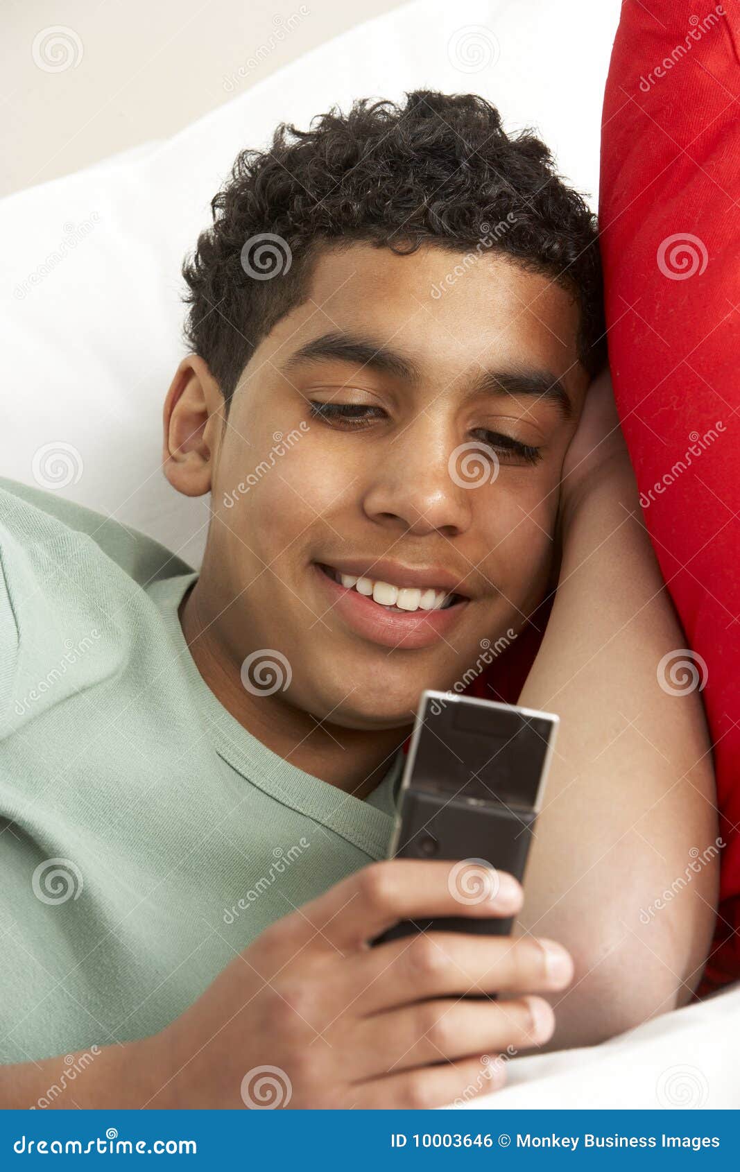 Young Boy Reading Text Message Stock Photo - Image of happy, twelve ...