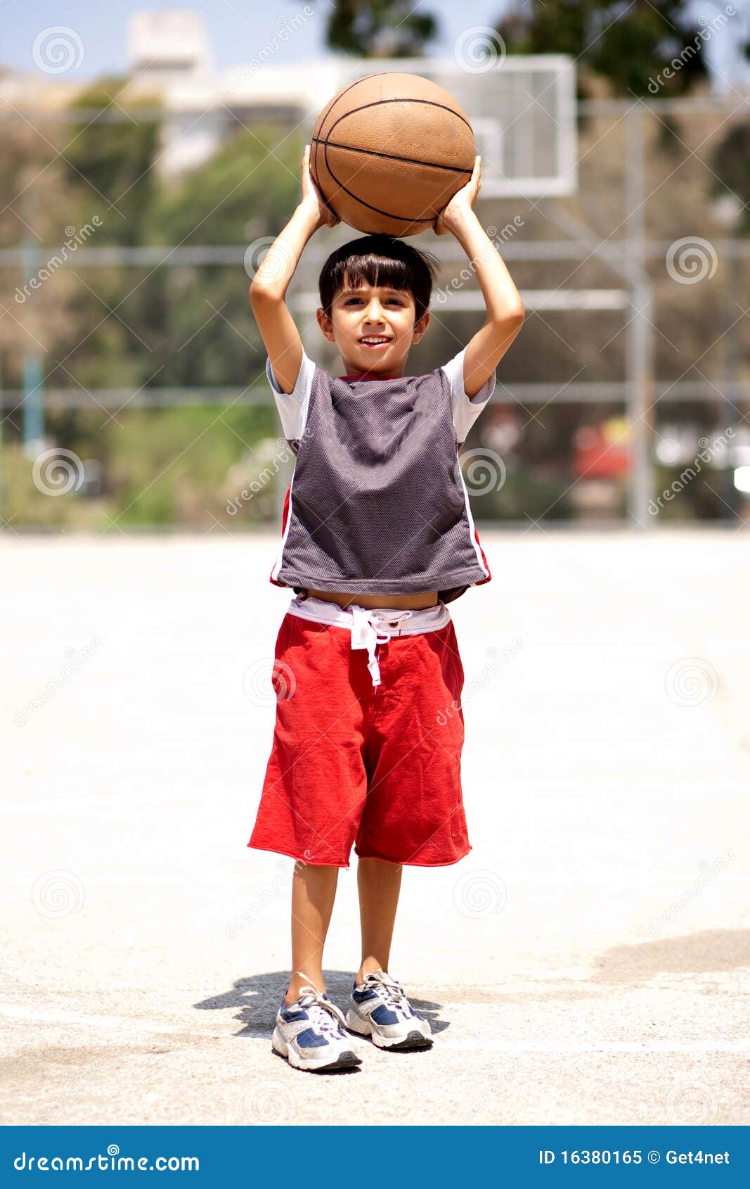 Young Boy Ready To Shot Basketball Stock Image - Image of playful ...