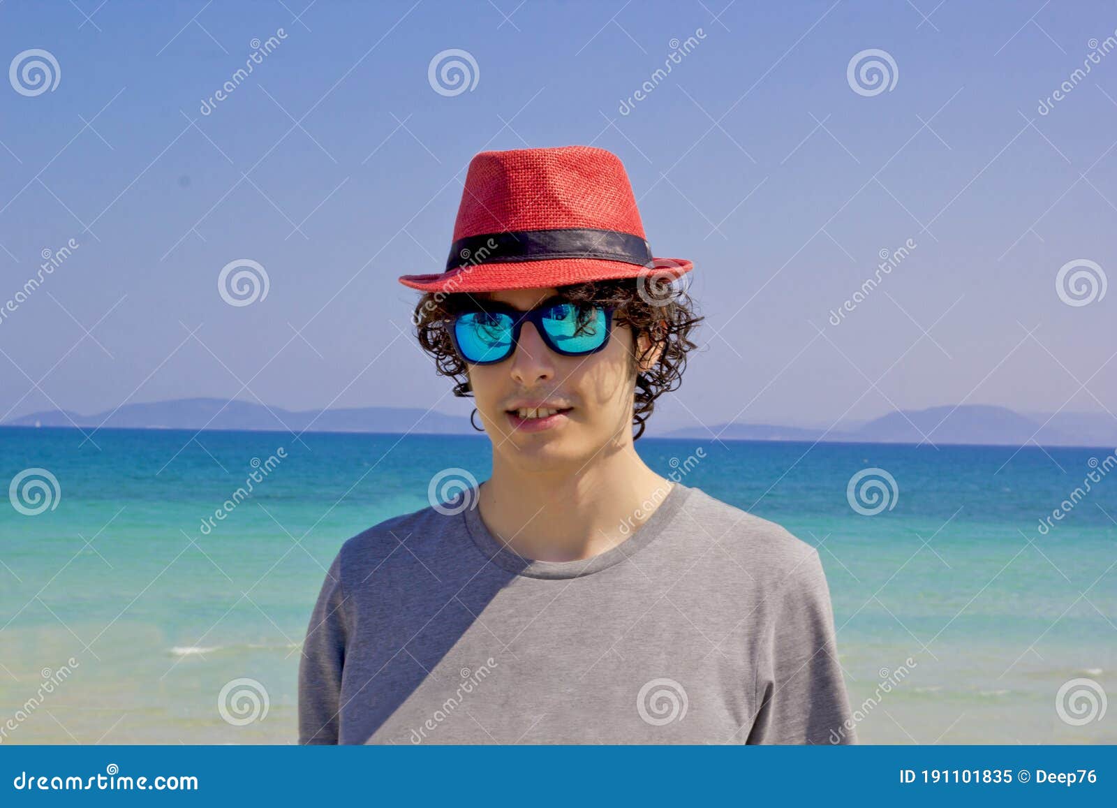 Young Boy in Red Hat on the Beach Stock Image - Image of nature, blue ...