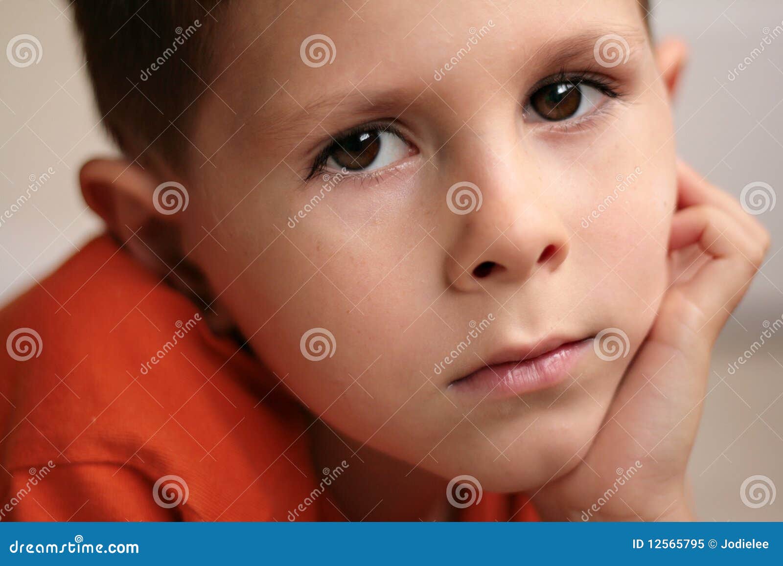 Young Boy Relaxed Smiling with Hands on Chin Stock Image - Image of ...