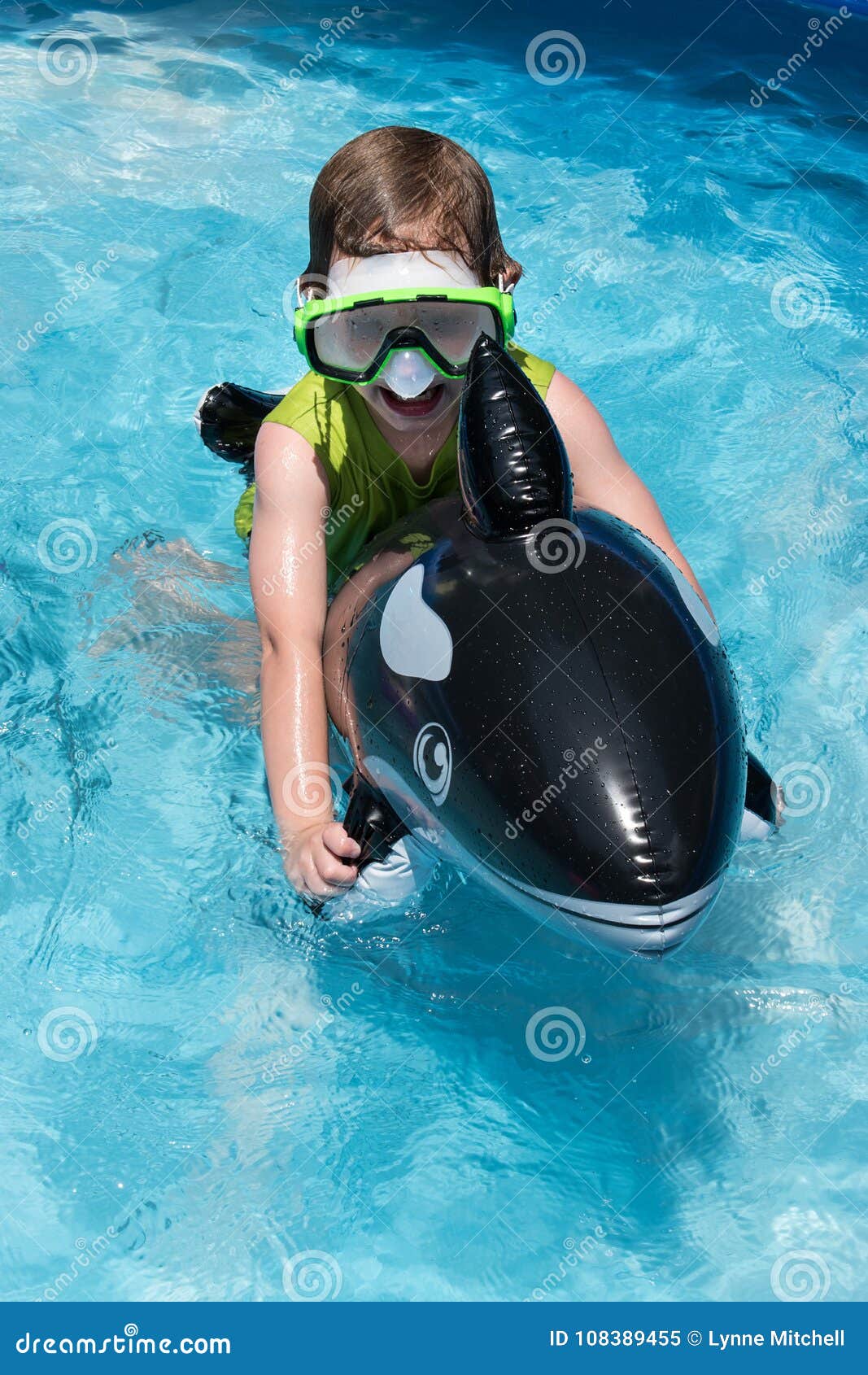 Young Boy Riding Float in Pool Swimming Forward Stock Image - Image of ...