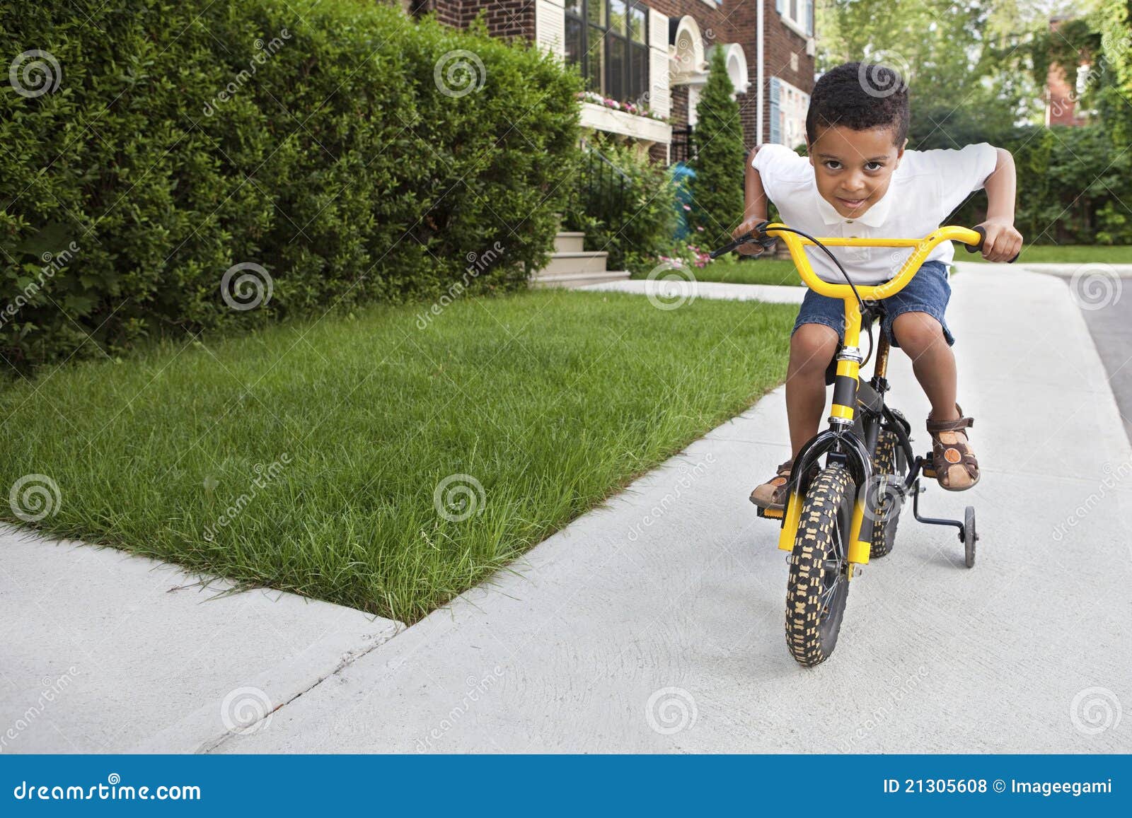 Young Boy Riding His Bicycle Stock Photo - Image of bicycle, child ...