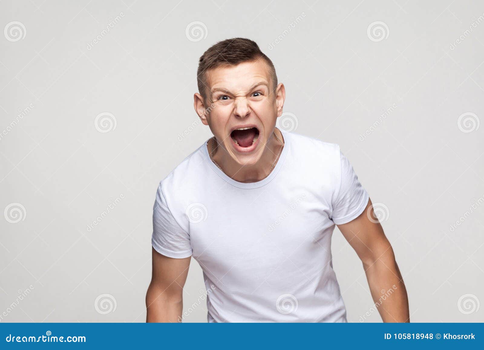 Young boy roar at camera stock photo. Image of pain - 105818948