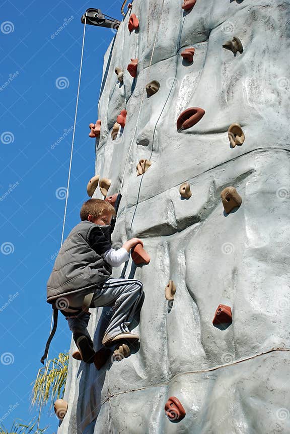 Young Boy Rock Climbing stock photo. Image of rockclimber - 10250684
