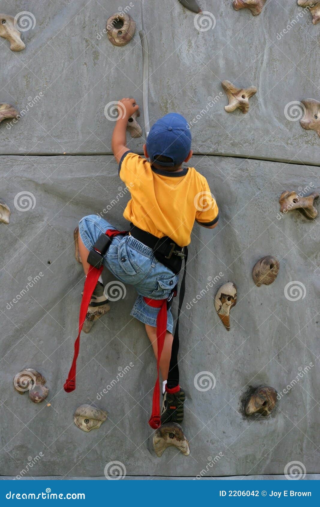 Young boy rock climbing stock photo. Image of safety, male - 2206042