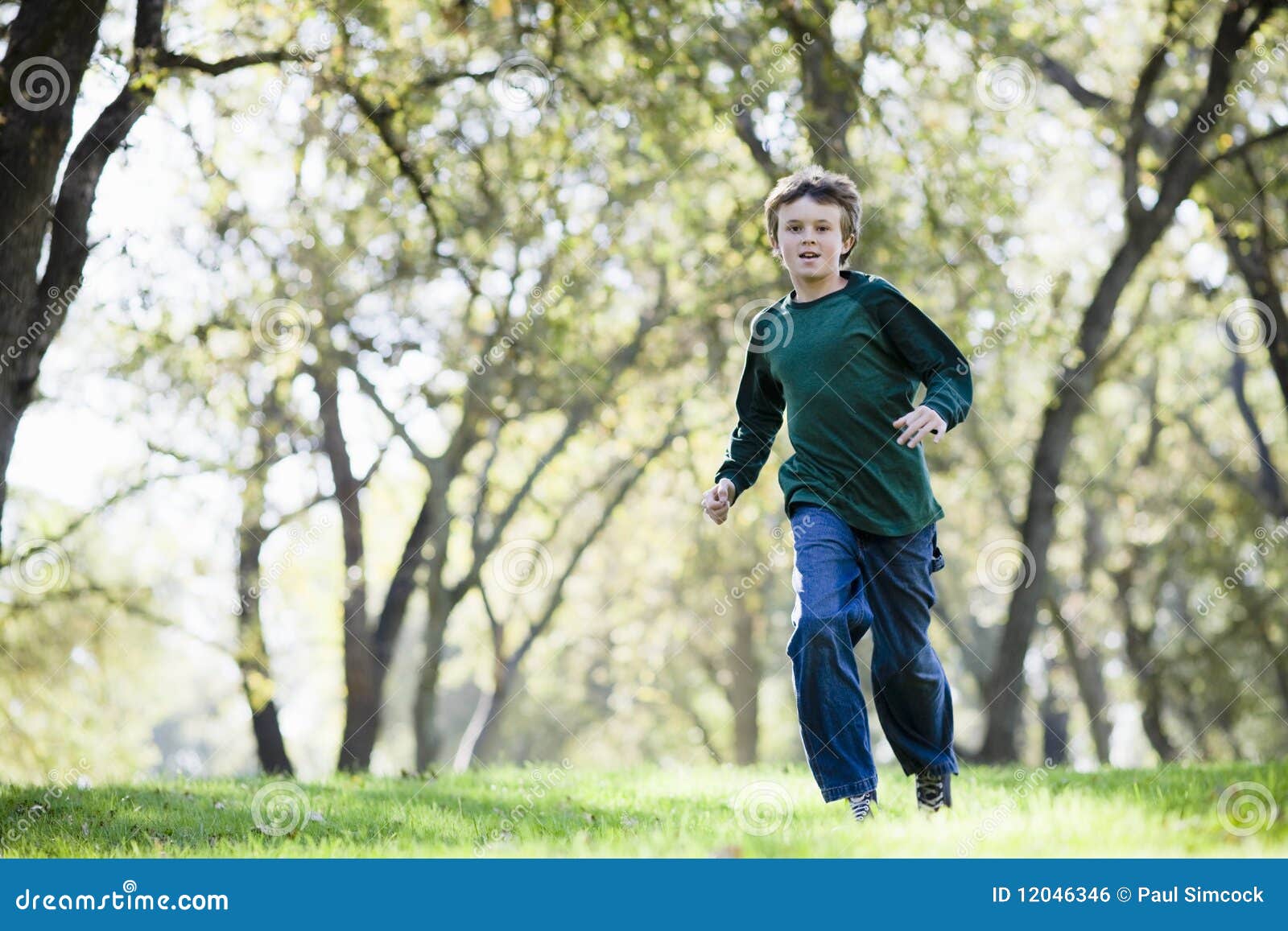 Young Boy Running stock photo. Image of smiling, juvenile - 12046346