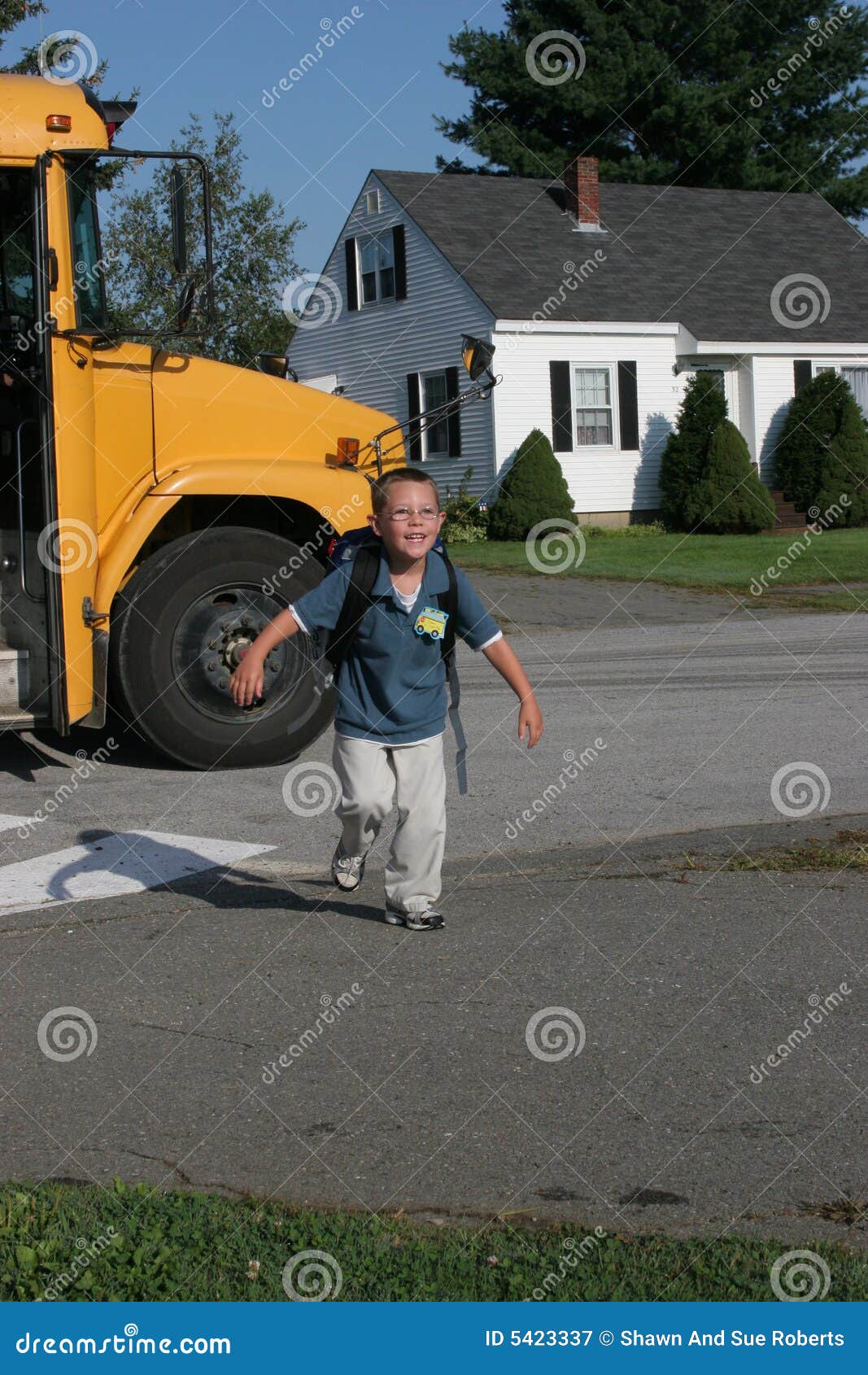 Young Boy Running Off the School Bus Smiling Stock Image - Image of ...