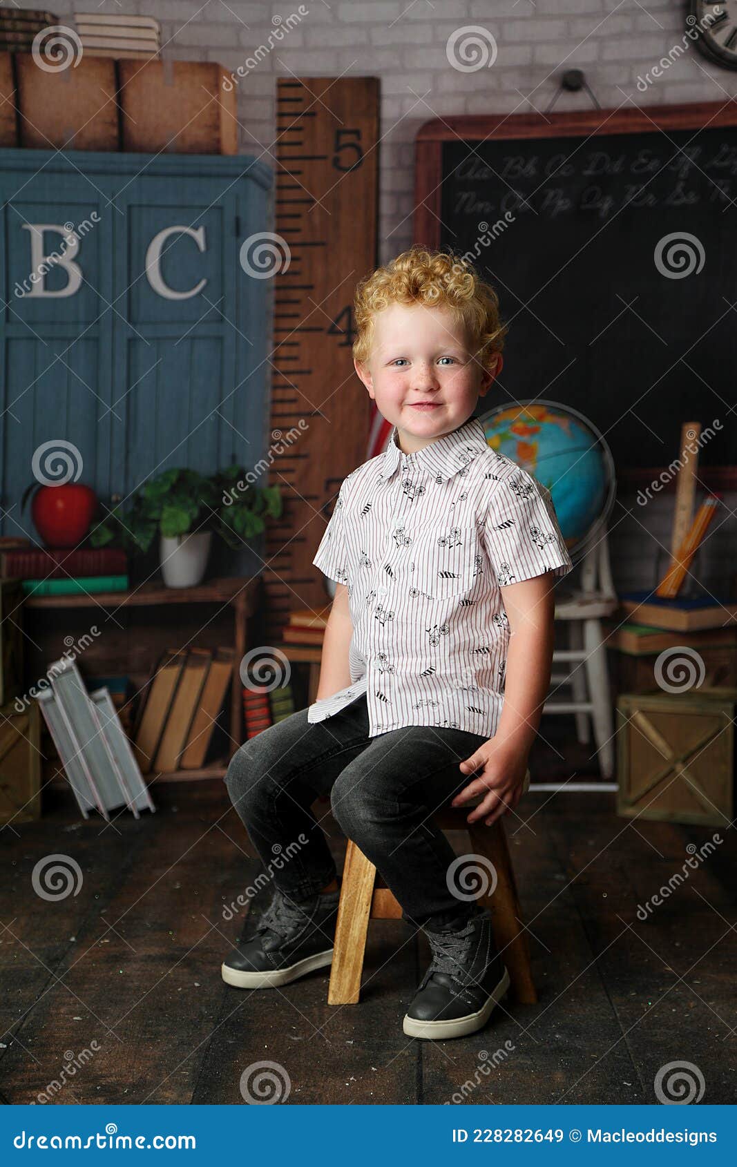 Young Boy Sat on Stool in School Stock Image - Image of cute, casual ...