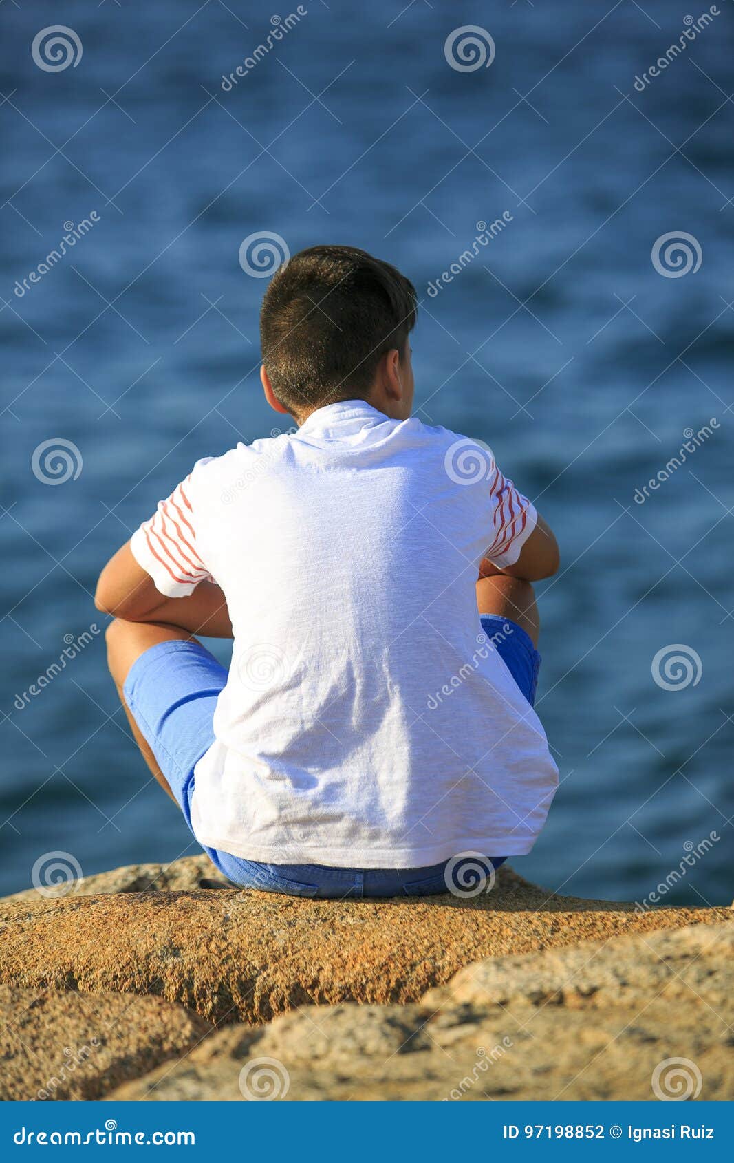 Young boy seeing the sea stock photo. Image of meditation - 97198852
