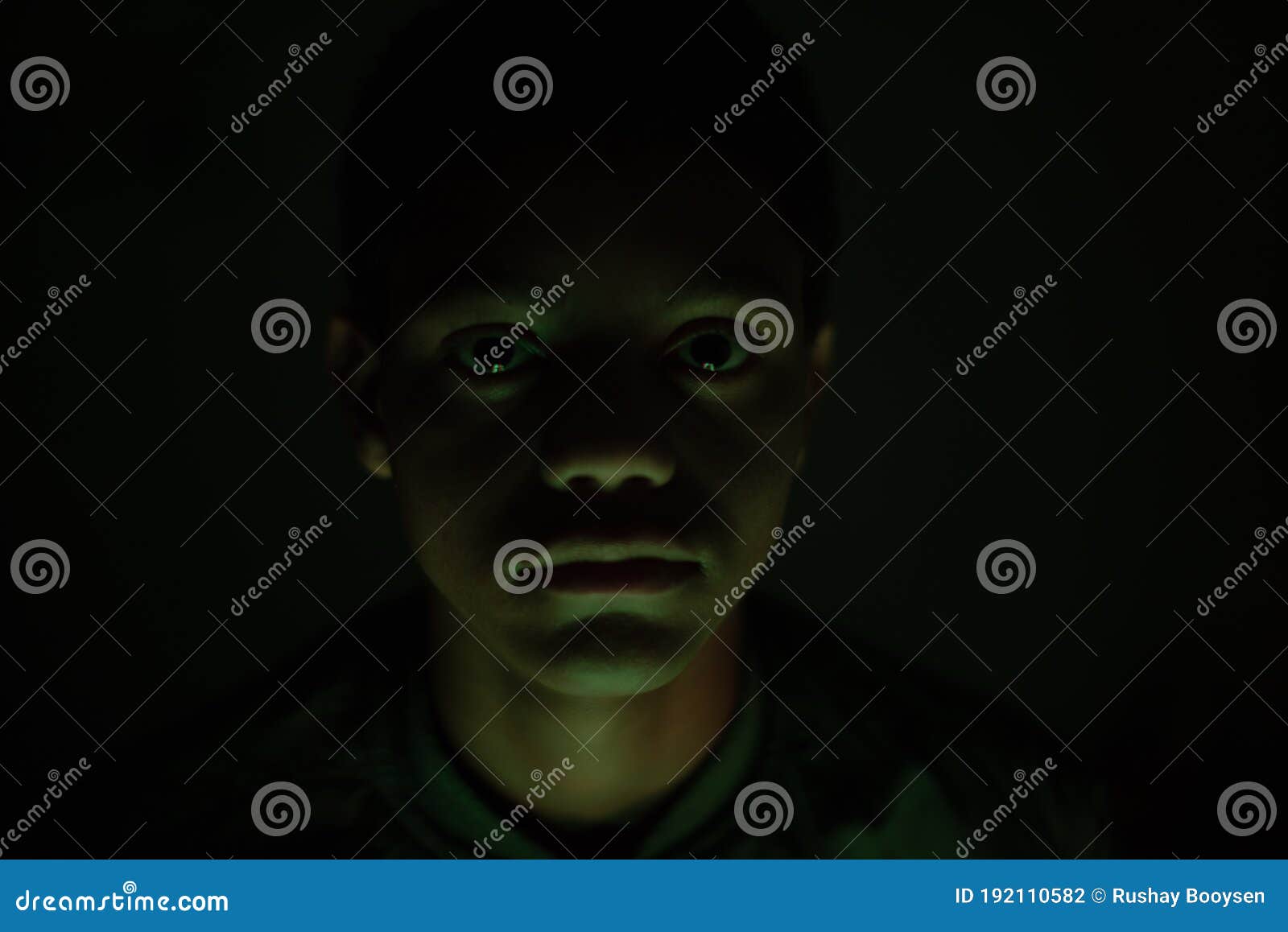 Close Up Portrait of Young Boy in Dark Room Stock Photo - Image of ...