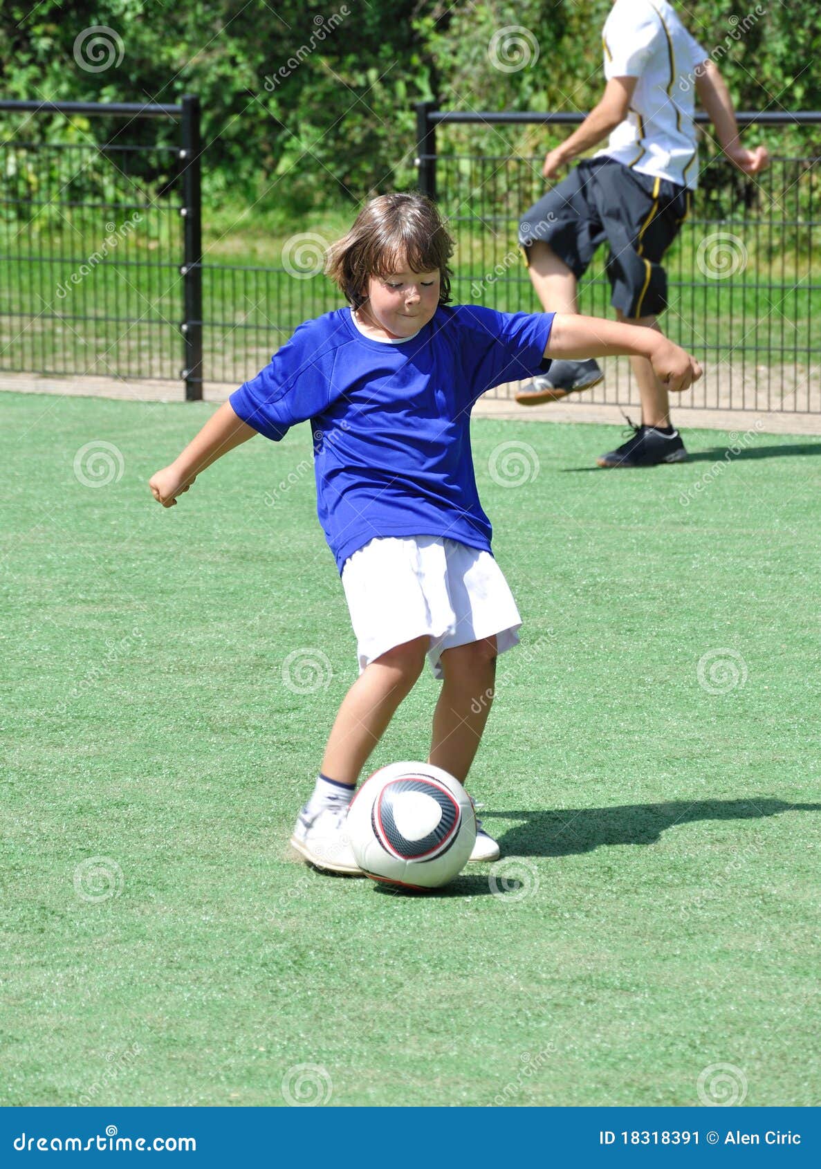 Young boy shooting ball stock image. Image of human, person - 18318391