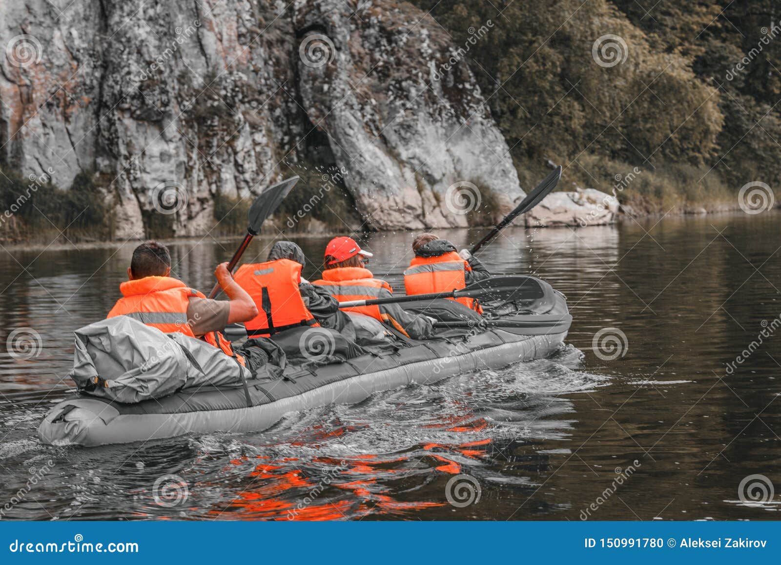 A Young Boy Sits at the Very Front of the Raft. Stock Photo - Image of ...