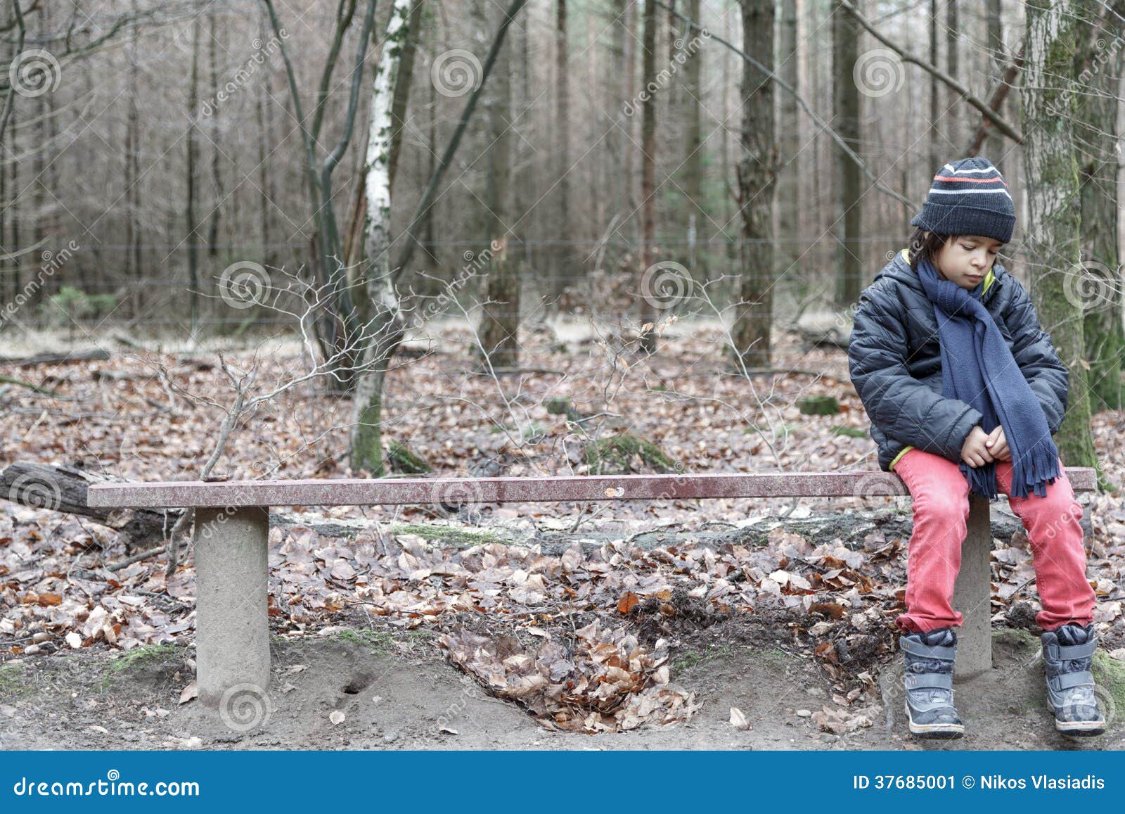 Young Boy Sitting Alone on a Rustic Bench Stock Image - Image of ...