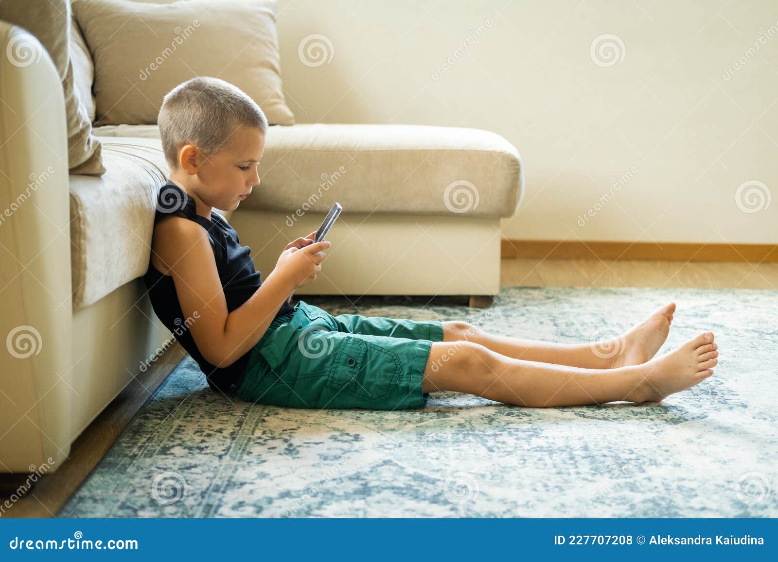 Young Boy Playing in Smartphone. Stock Photo - Image of lifestyle ...