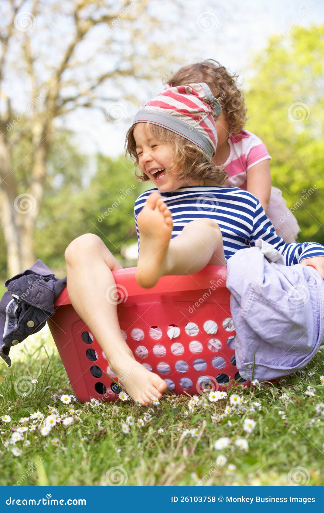 Young Boy Sitting in Laundry Basket Stock Photo - Image of laughing ...